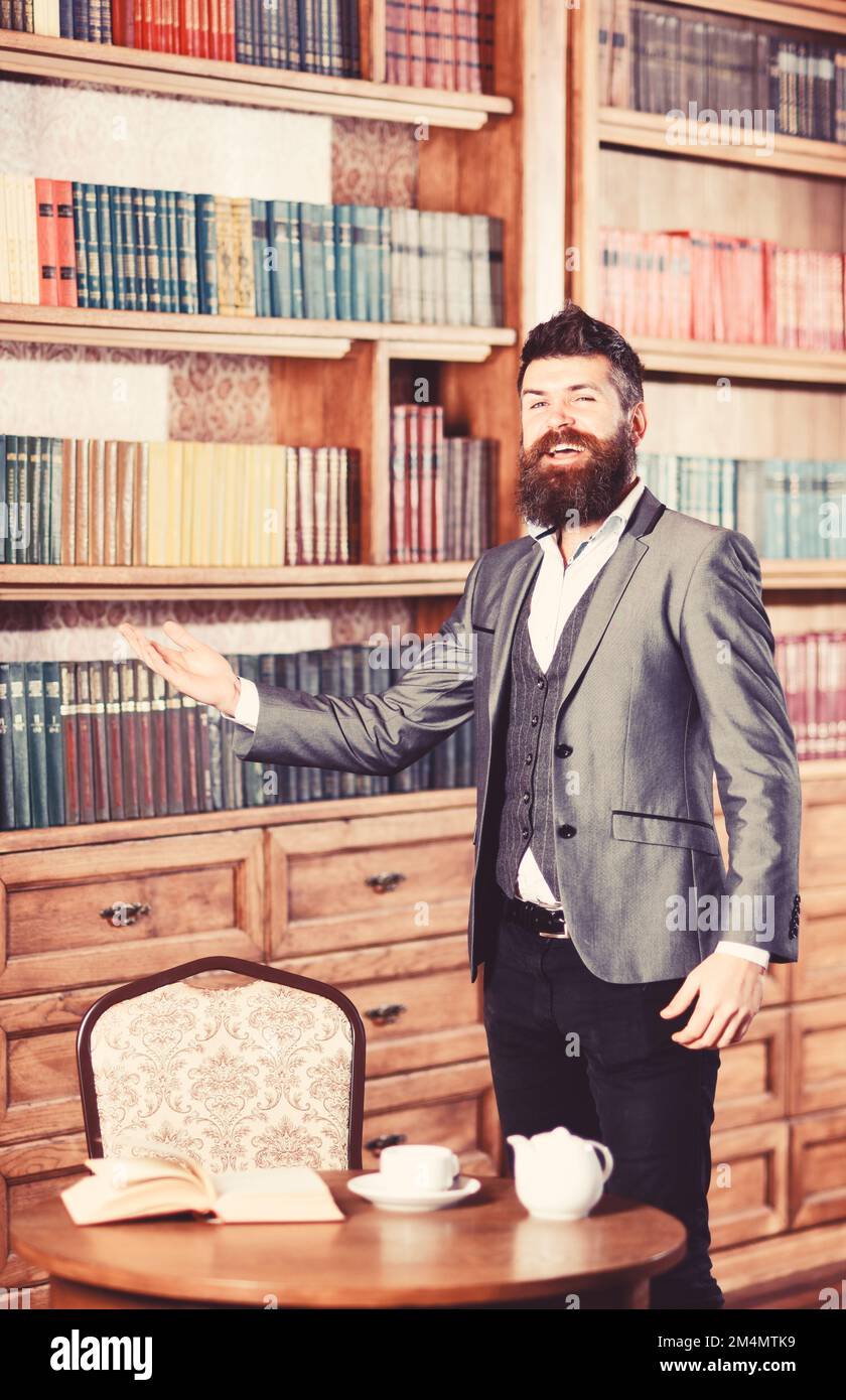 joyful guy standing looks into the camera and shows boo Stock Photo - Alamy