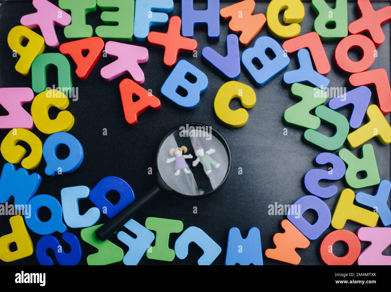 Kids under Magnifying glass and Colorful Letters of Alphabet Stock ...
