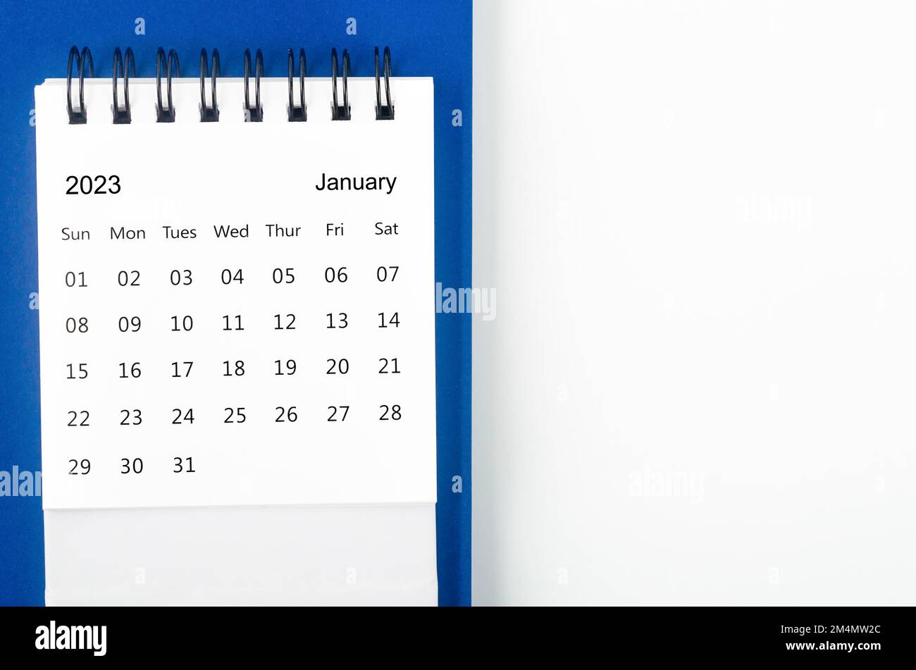 January 2023 Monthly desk calendar for 2023 year on blue and white ...