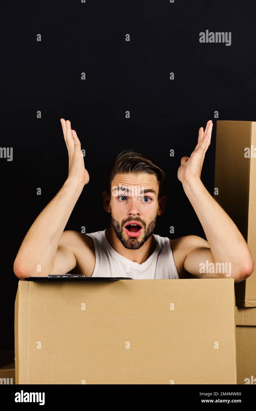 Macho with beard and surprised face with his hands up Stock Photo - Alamy