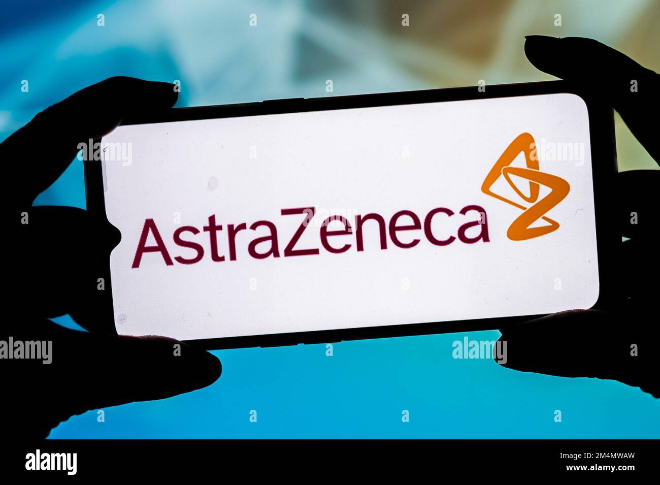 In this photo illustration, an Astra Zeneca logo seen displayed on a smartphone Stock Photo - Alamy