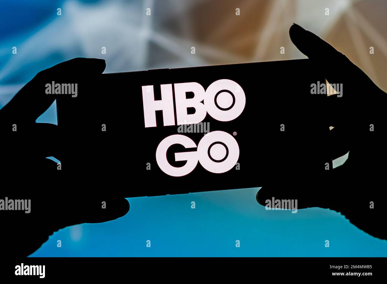 In this photo illustration, a HBO GO logo seen displayed on a smartphone Stock Photo - Alamy
