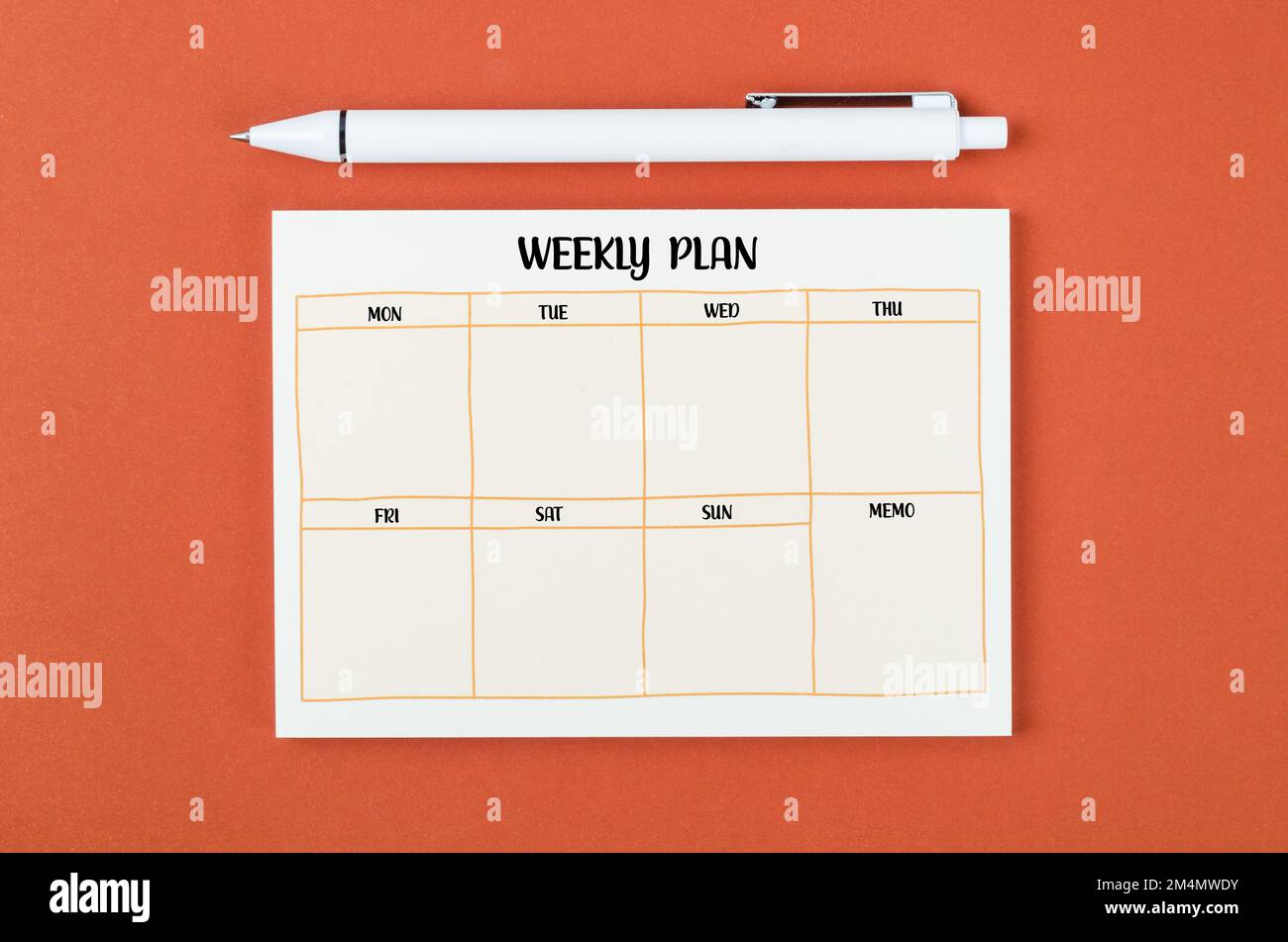 Blank weekly plan notice block on orange colour background. Empty ...