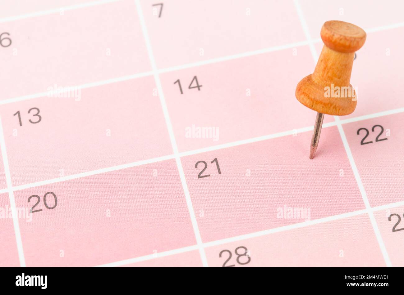 The concept of planning and deadline with push pin on blank calendar ...