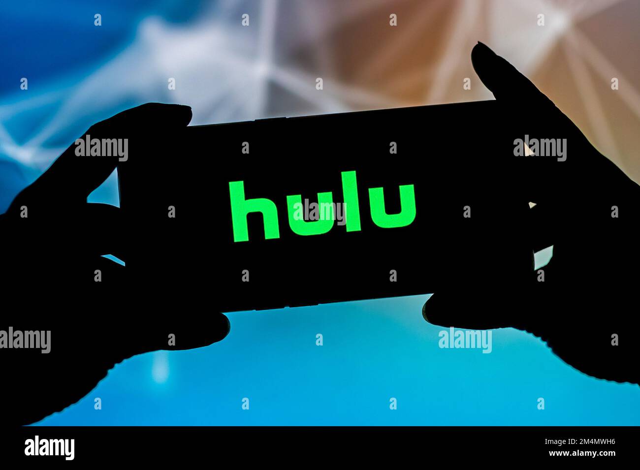 In this photo illustration, a Hulu logo seen displayed on a smartphone ...