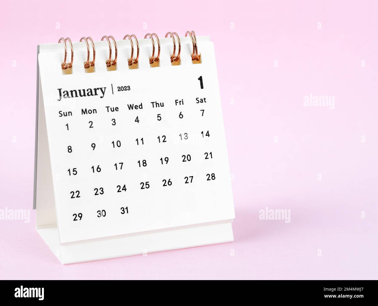 The January 2023 desk calendar on pink color background Stock Photo - Alamy