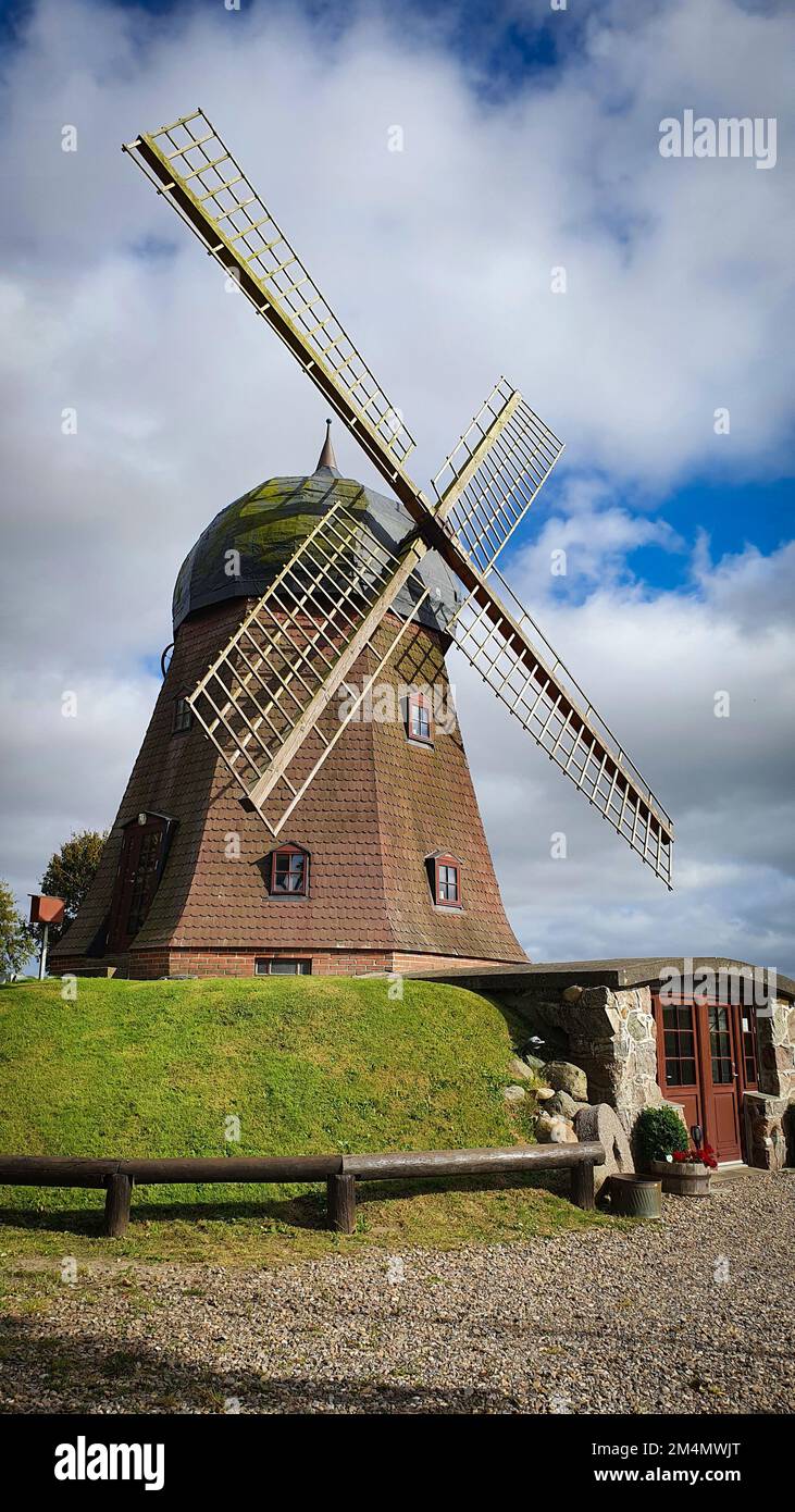 A vertical shot of a windmill Stock Photo - Alamy