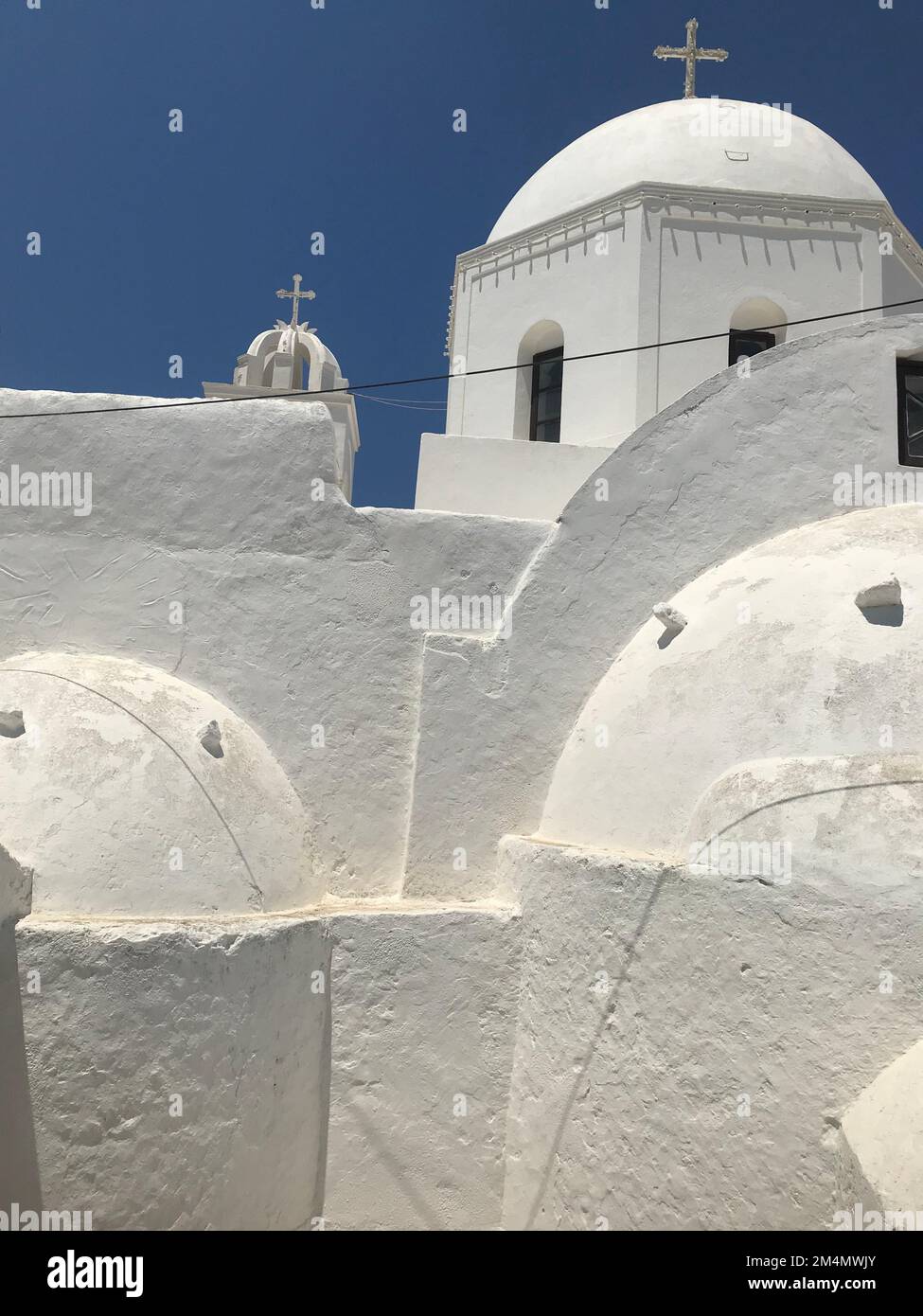 A vertical shot of a white church building Stock Photo - Alamy