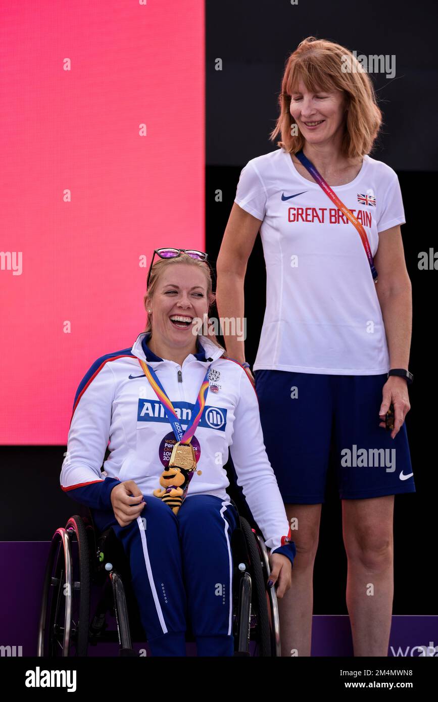 Female coach with medal hi-res stock photography and images - Alamy