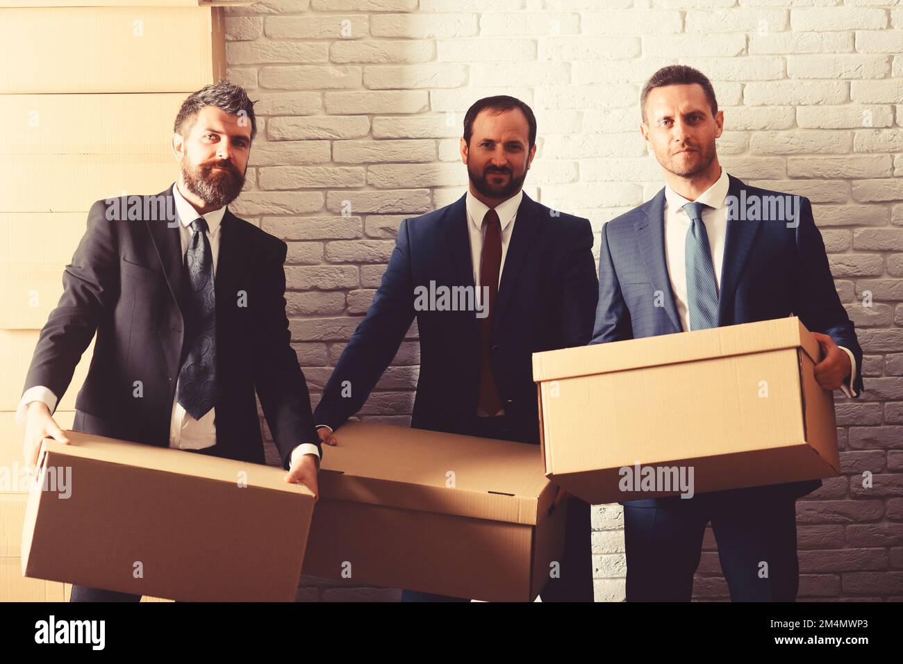 Businessmen wear smart suits and ties. Men with beard Stock Photo - Alamy