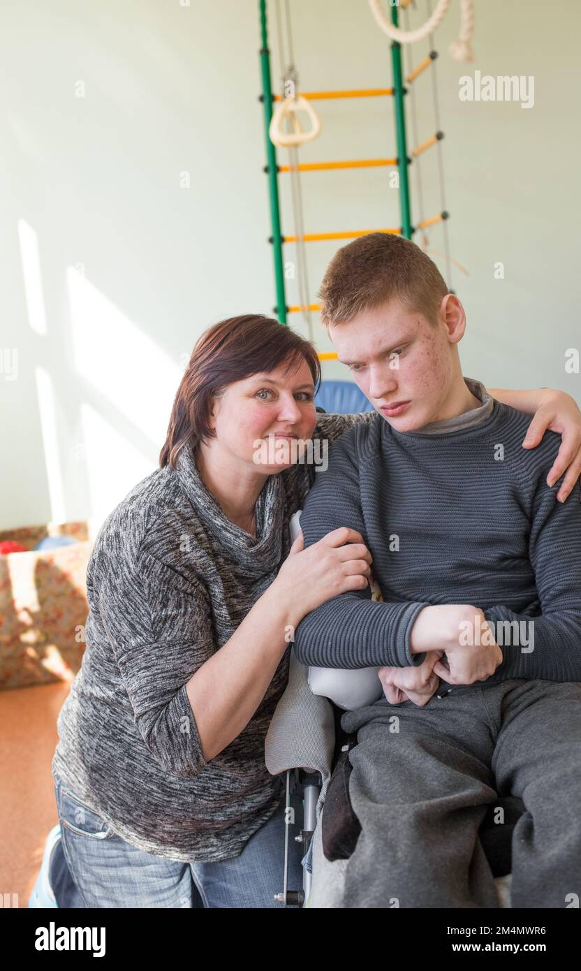 a boy with a disability in a rehabilitation center with special needs ...