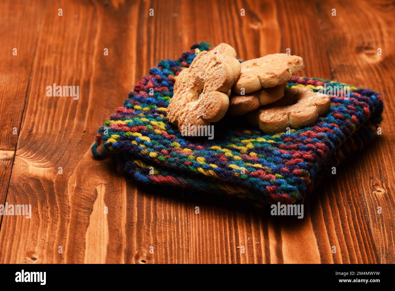 Tea cookies on wooden background. Flower shaped biscuits Stock Photo ...