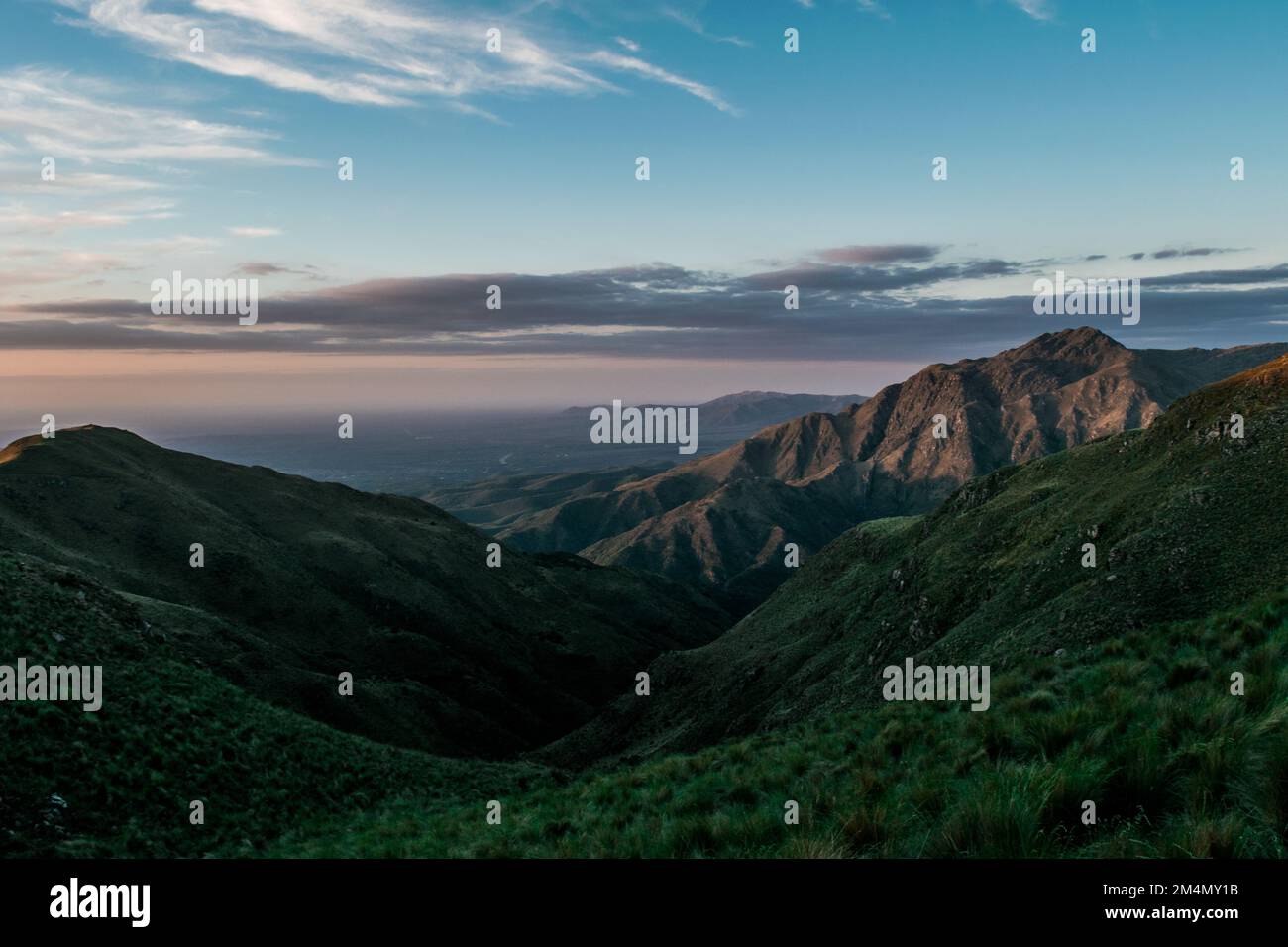 An aerial view of mountains at sunset Stock Photo - Alamy