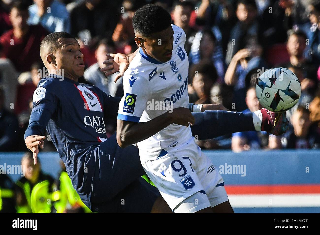 Kylian MBAPPE of PSG and Rayan RAVELOSON of Auxerre during the French ...