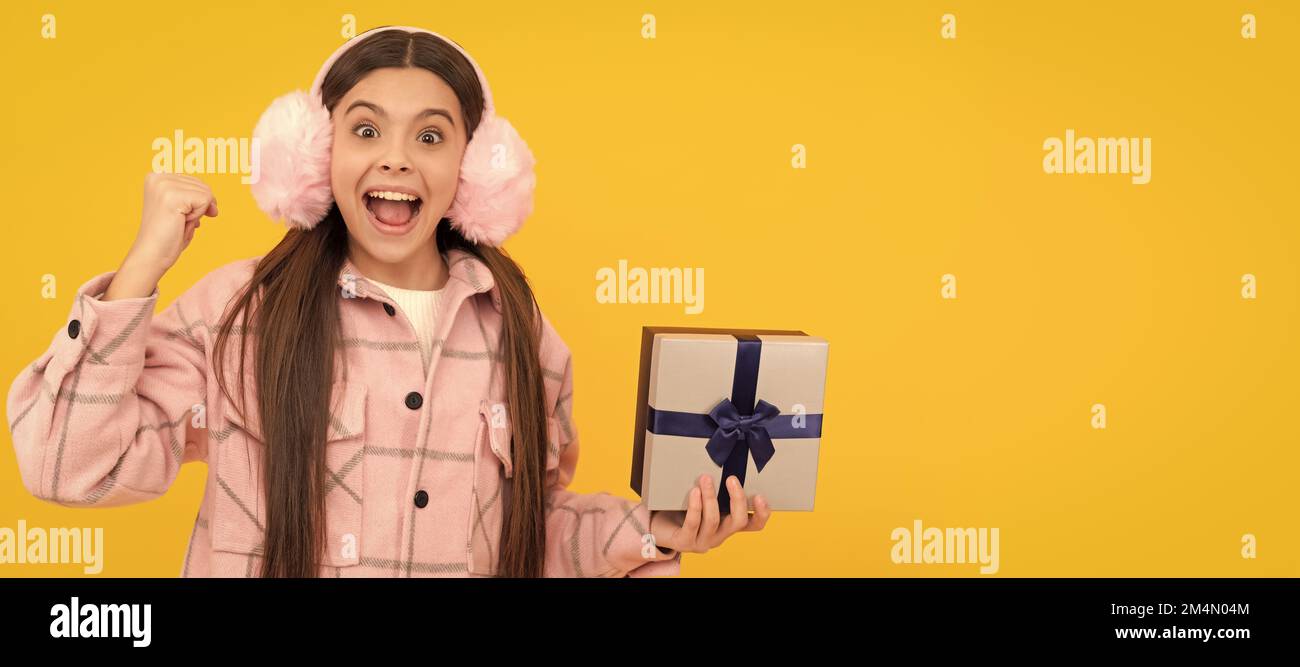 Child girl gift. Win a gift. Happy child hold present box making ...