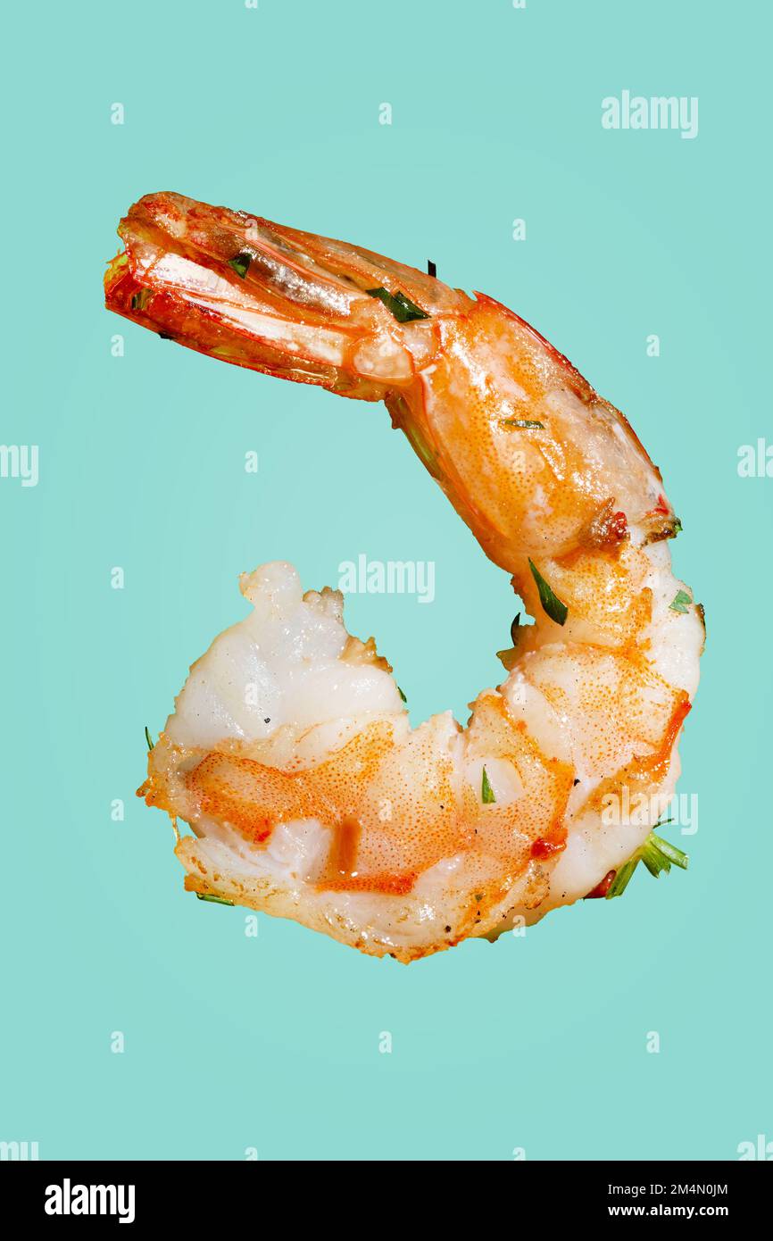 Roasted peeled prawn isolated on blue background ,grilled shrimp Stock ...