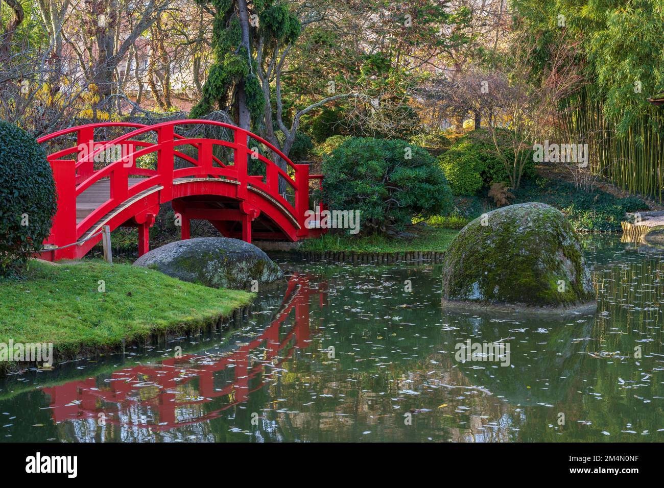 View in the Pierre Baudis japanese garden with traditional red wooden ...
