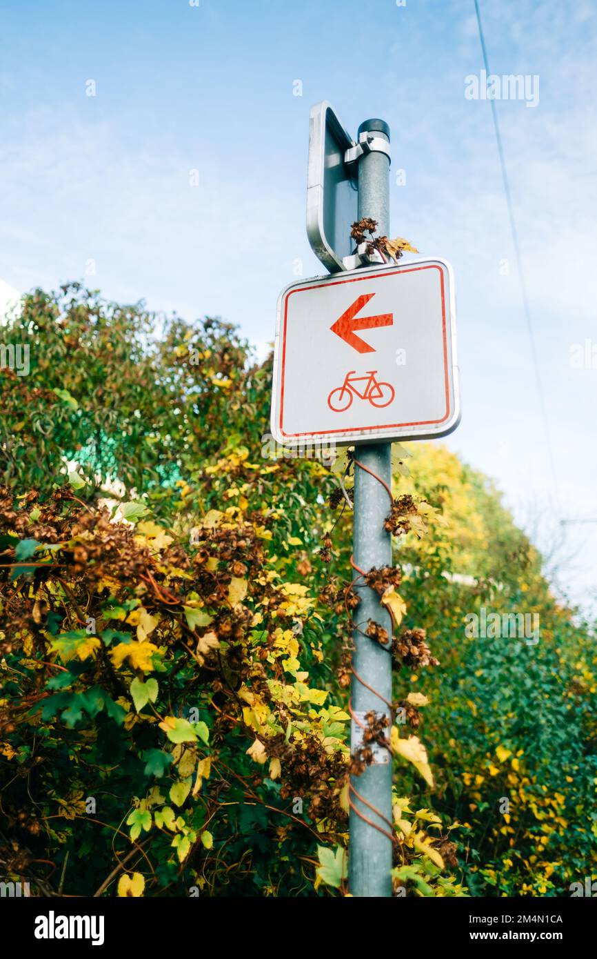 Bike path traffic sign in the park Stock Photo - Alamy