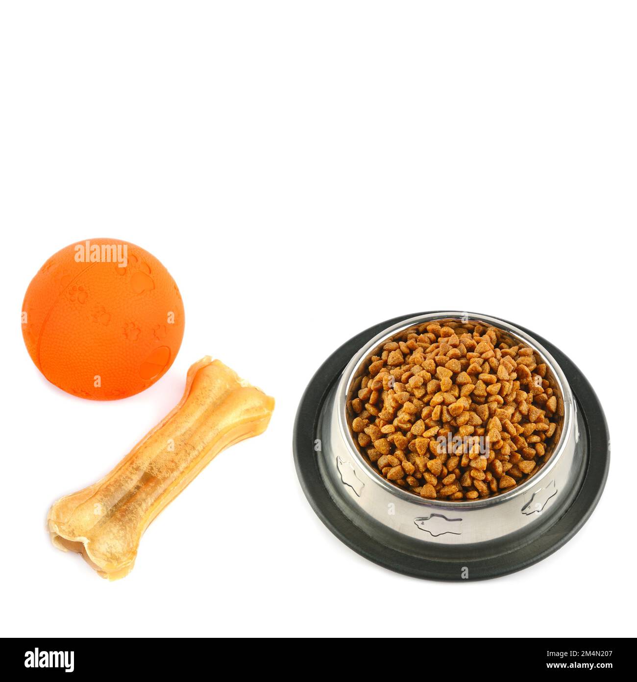 Dry dog food, chewing bone and ball isolated on white background. Free ...