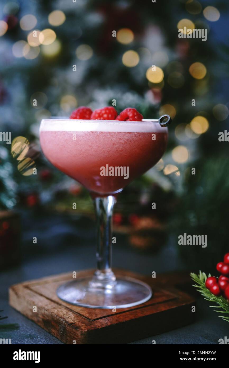 Clover club cocktail on festive holiday background, selective focus ...
