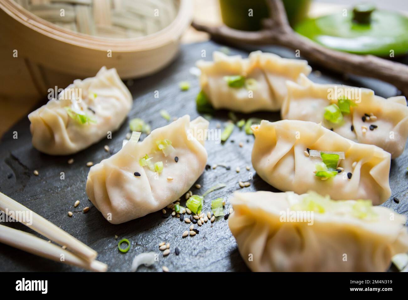 Gyozas, Japanese dumplings. Traditional gyozas are filled with minced ...