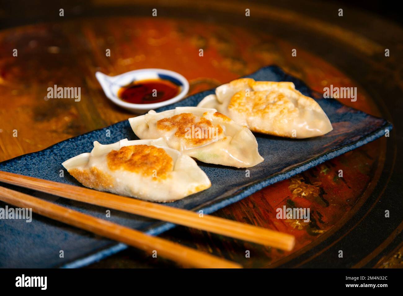 Gyozas, Japanese dumplings. Traditional gyozas are filled with minced ...