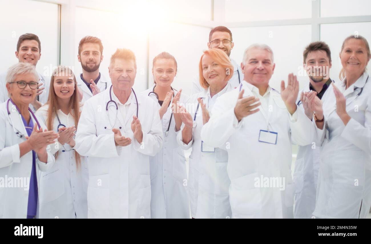 Group doctors applauding together hi-res stock photography and images ...