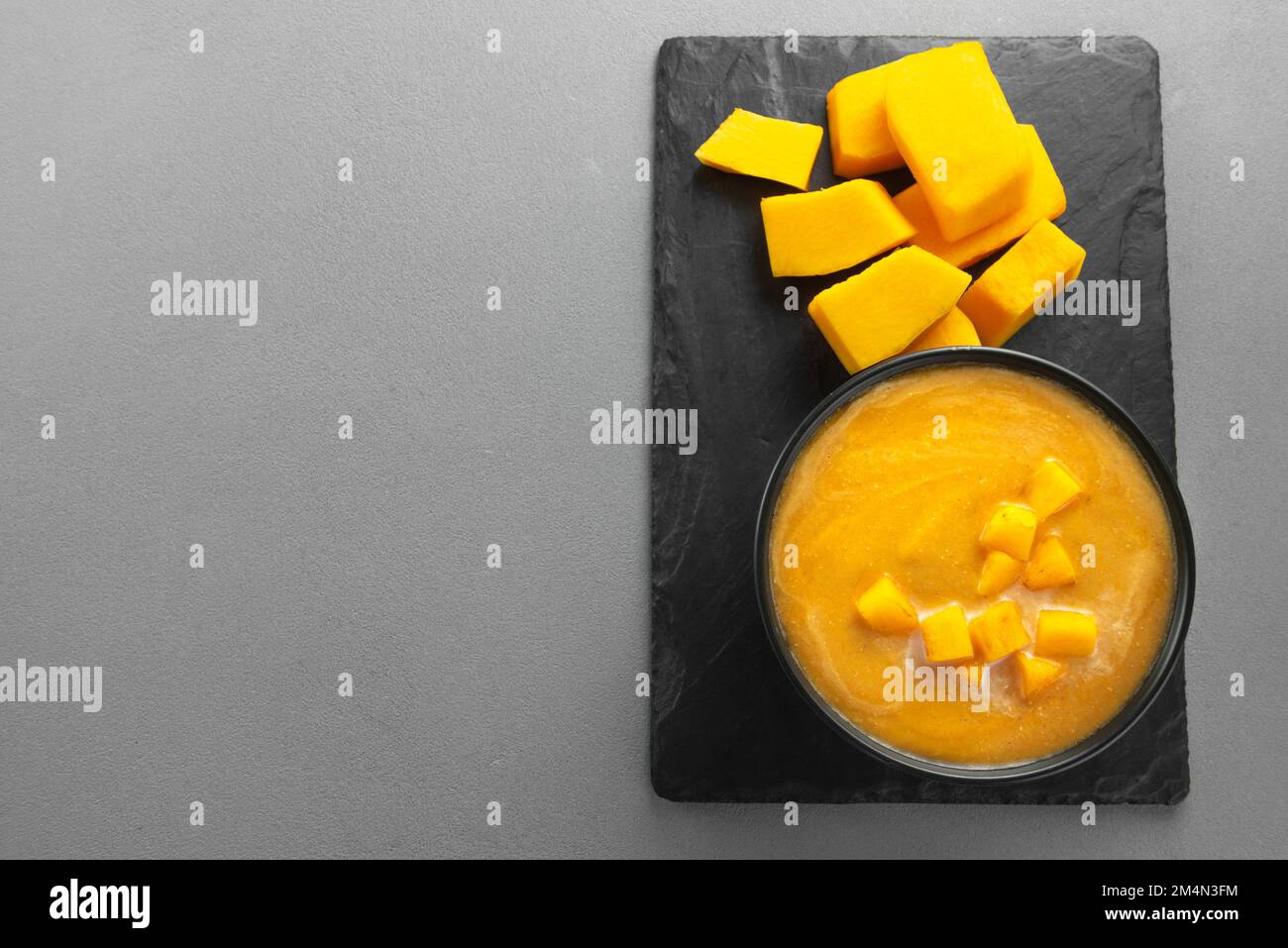 Pumpkin traditional soup with creamy silky texture. Vegetarian fall ...