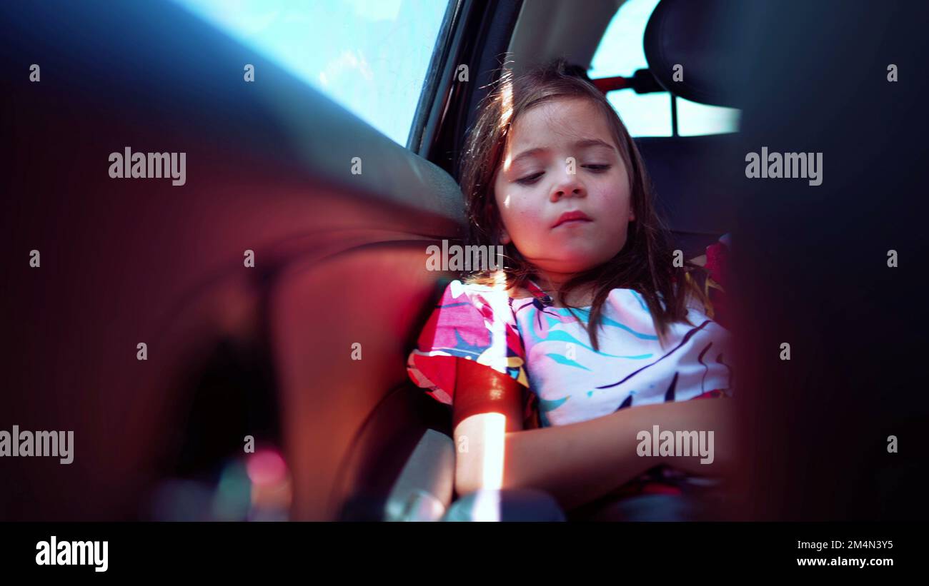 Child in car backseat. Little girl travels in vehicle transportation ...