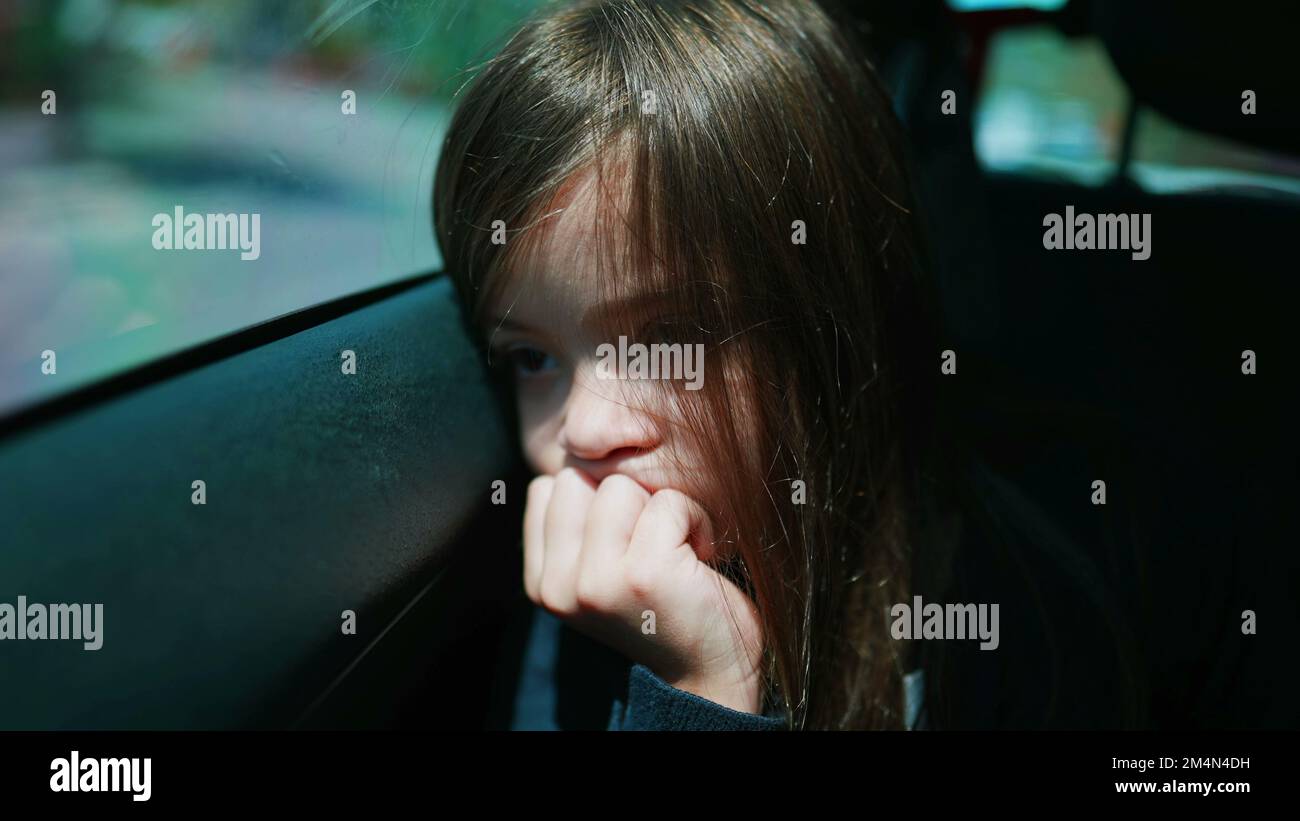 Portrait of a bored sleepy child feeling bore and sadness. Sad little ...