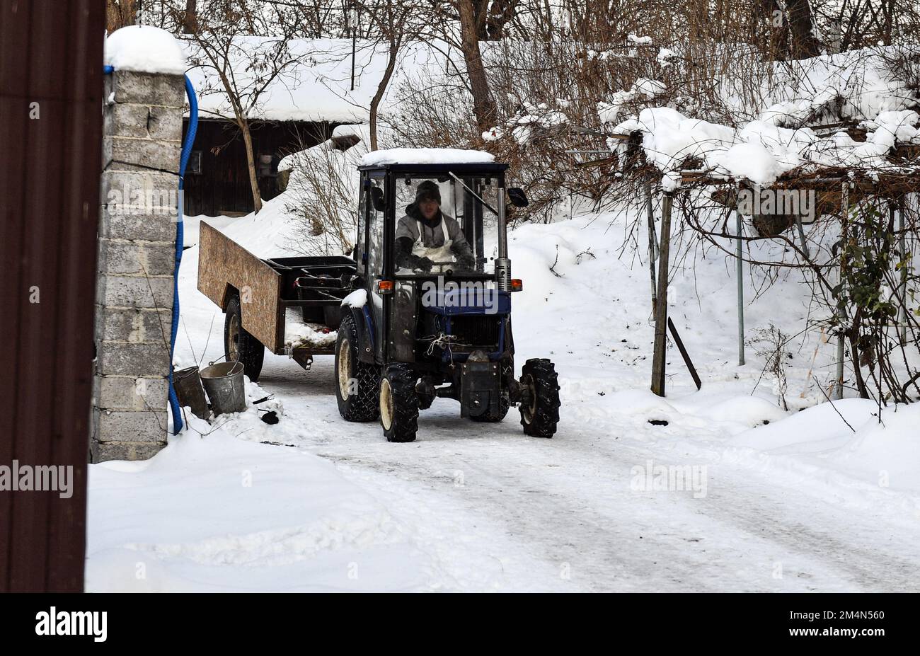 A man transports the caught fish by tractor to the monastery in ...
