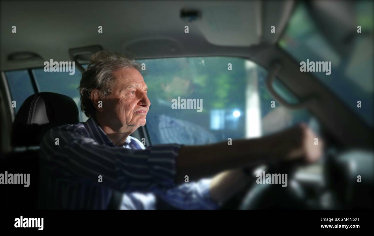 One senior man driving night hi-res stock photography and images - Alamy