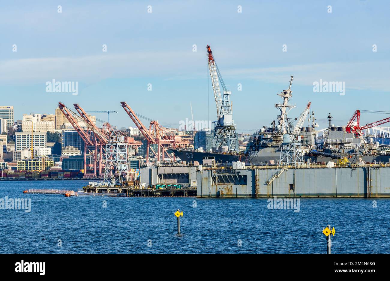 A variety of ships and machinery create congestion at the Port of ...