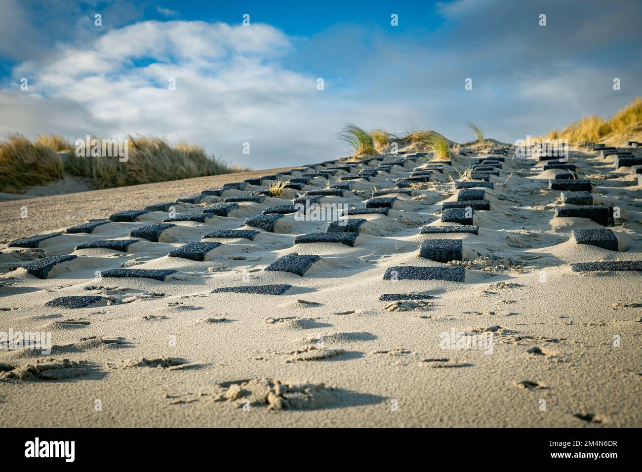 square stone blocks to protect the coast from the sea Stock Photo - Alamy