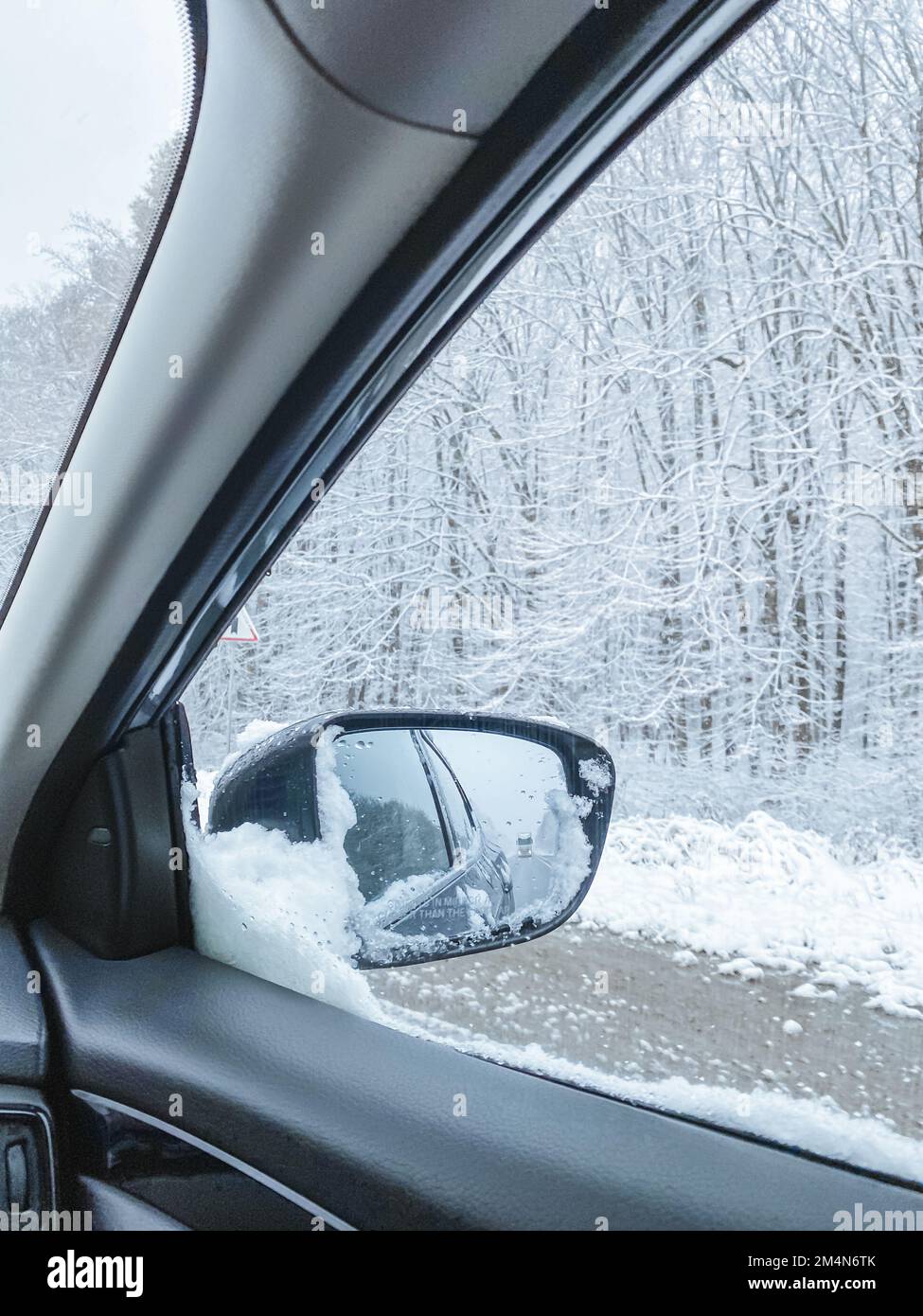 a view of the winter landscape from the window of the car Stock Photo ...