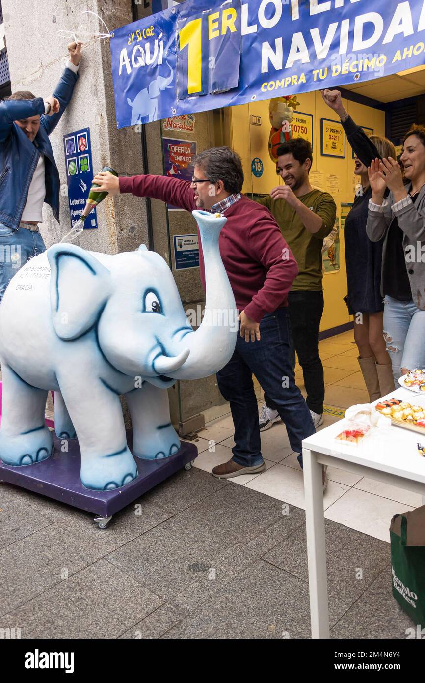 The owner of a lottery administration in Madrid celebrates the sale in ...