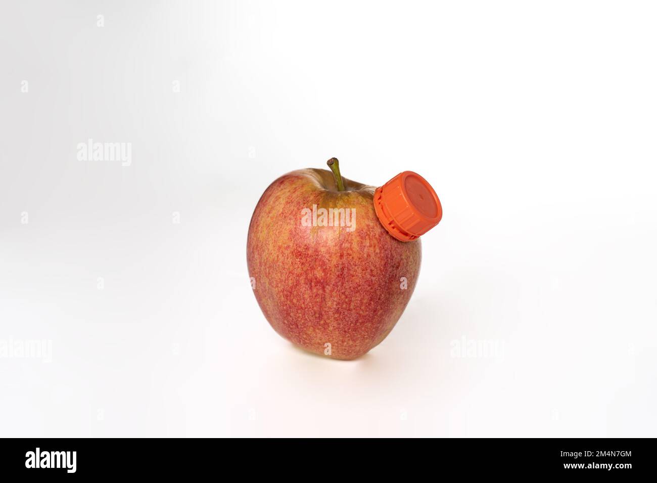 Apple,fruit, on white background,with spout to drink as a juice pot ...