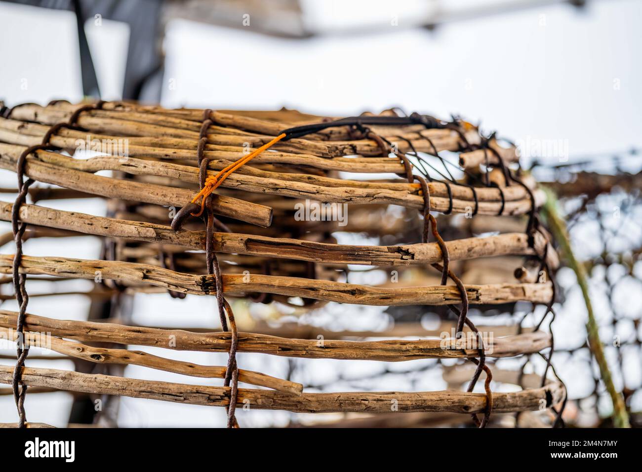 crayfish traps on a fishing boat. lobster wooden pots on the back of a ...