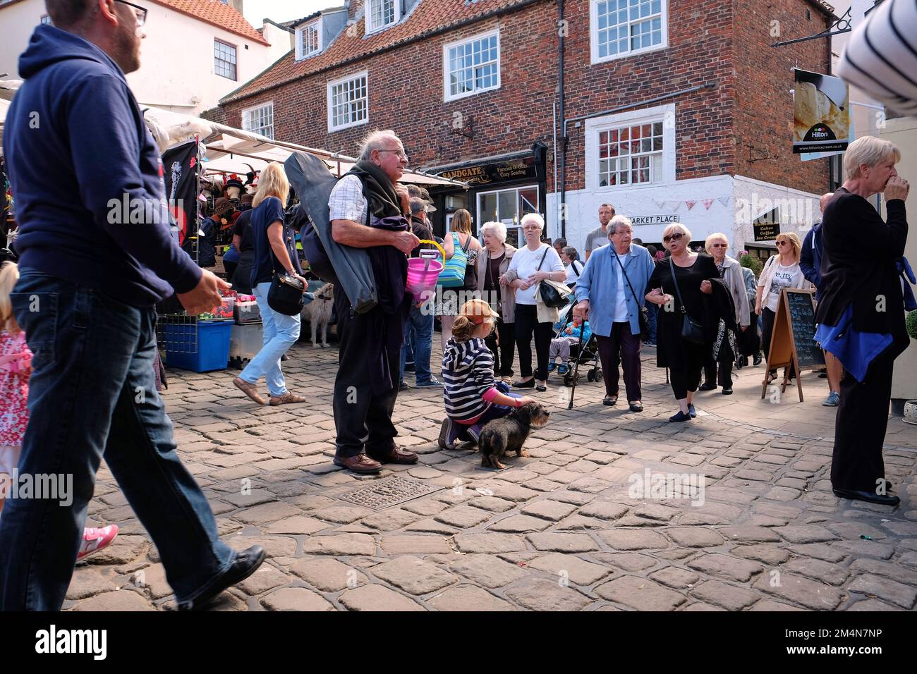 Crowded market place in Whitby, Yorkshire, UK Stock Photo - Alamy