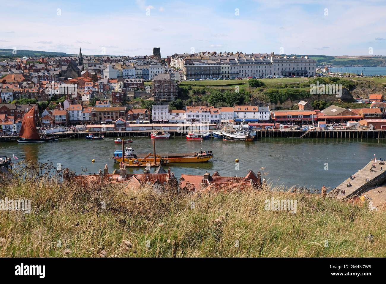 Summer harbor scene in Whitby, UK Stock Photo - Alamy