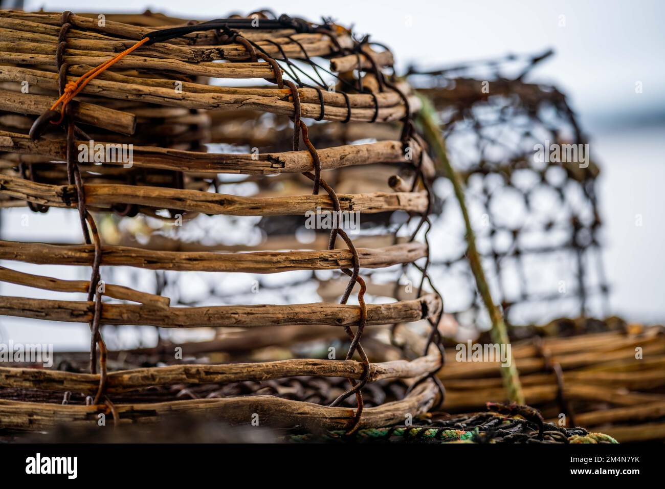 crayfish traps on a fishing boat. lobster wooden pots on the back of a ...