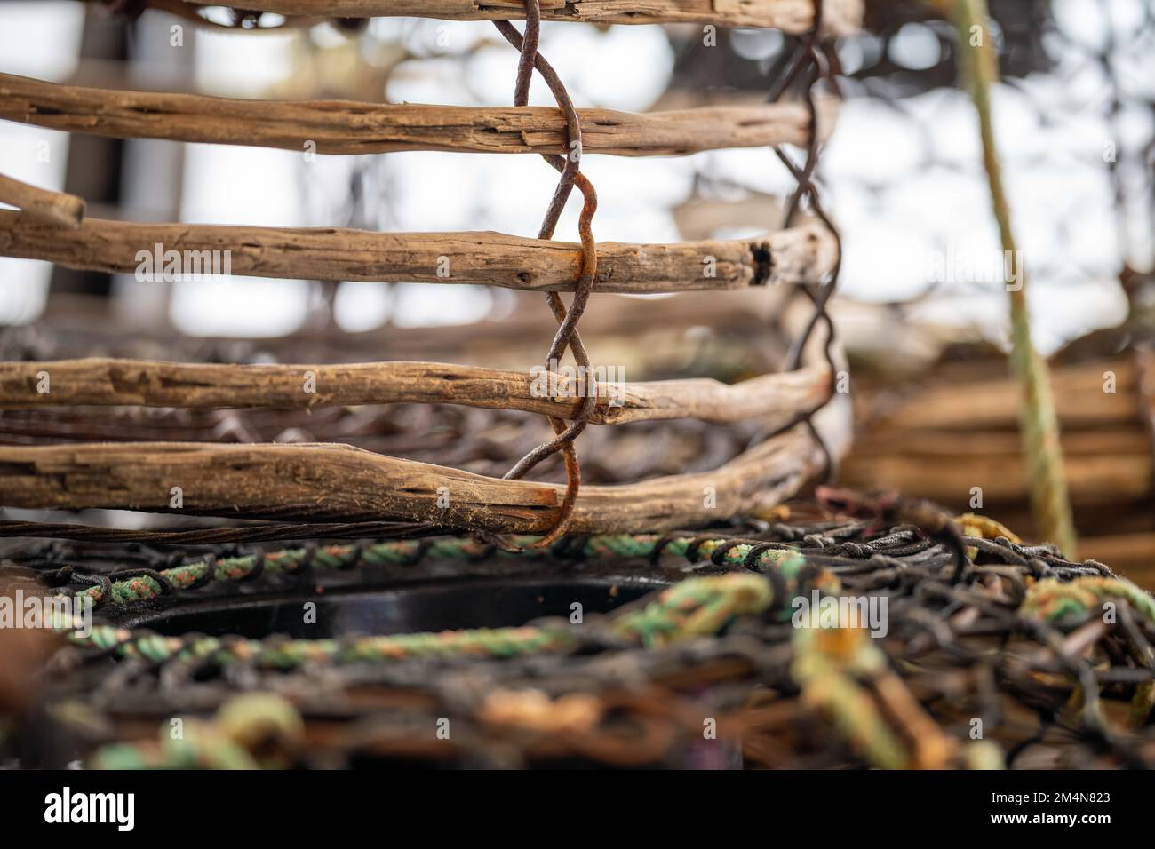 crayfish traps on a fishing boat. lobster wooden pots on the back of a ...