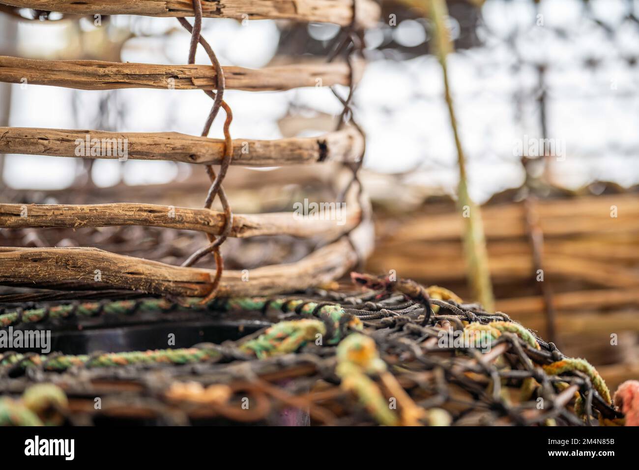 crayfish traps on a fishing boat. lobster wooden pots on the back of a ...