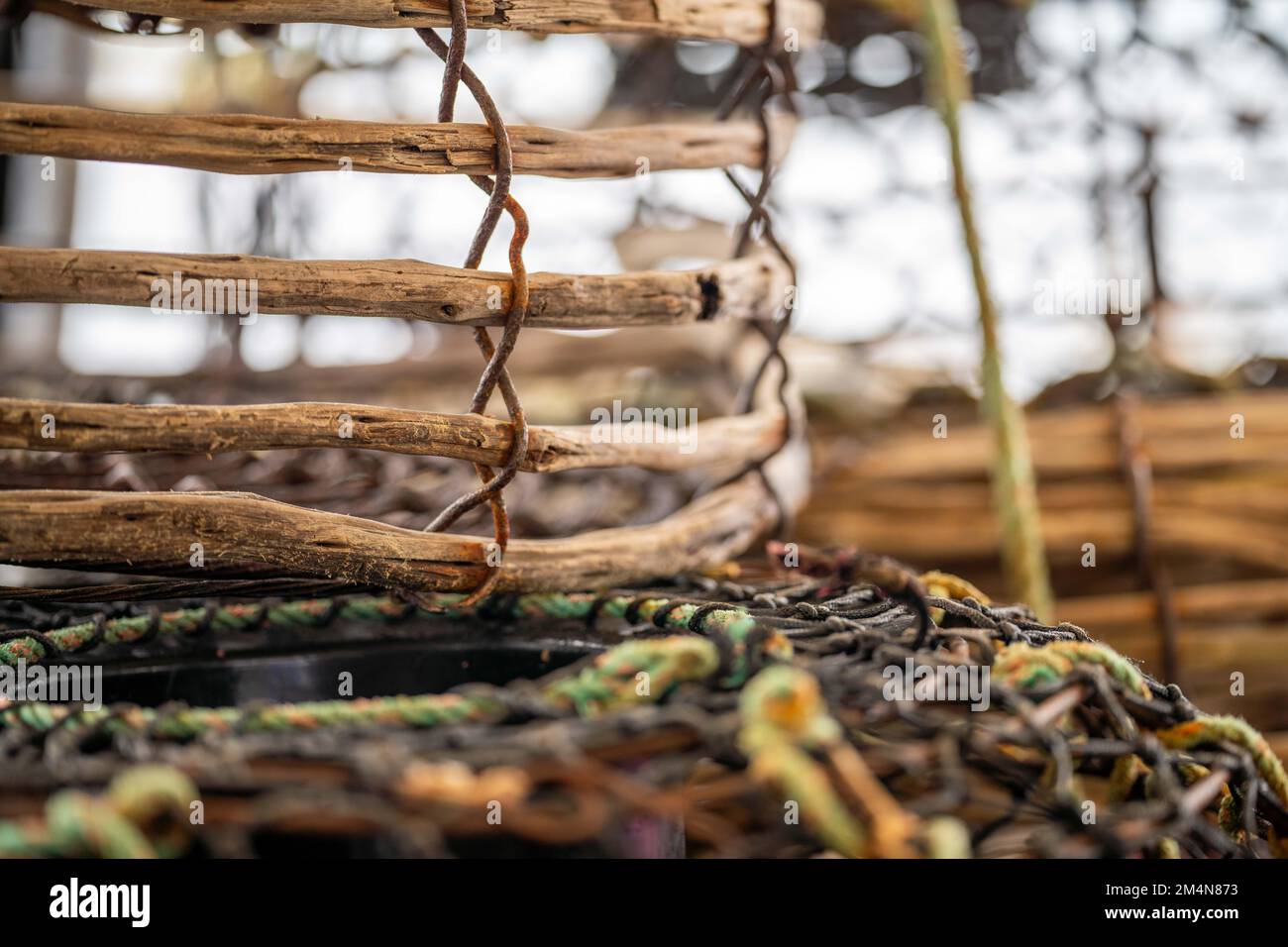 crayfish traps on a fishing boat. lobster wooden pots on the back of a ...