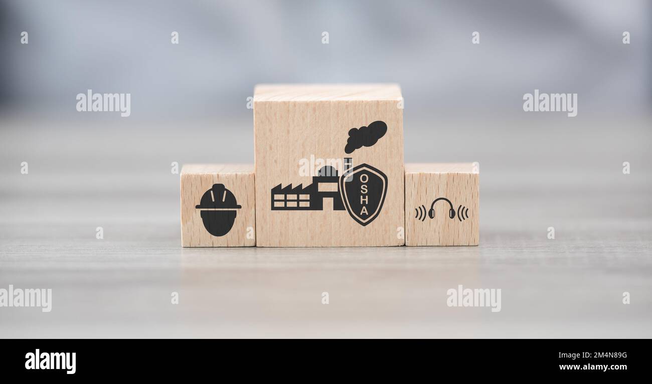 Wooden blocks with symbol of osha concept Stock Photo - Alamy