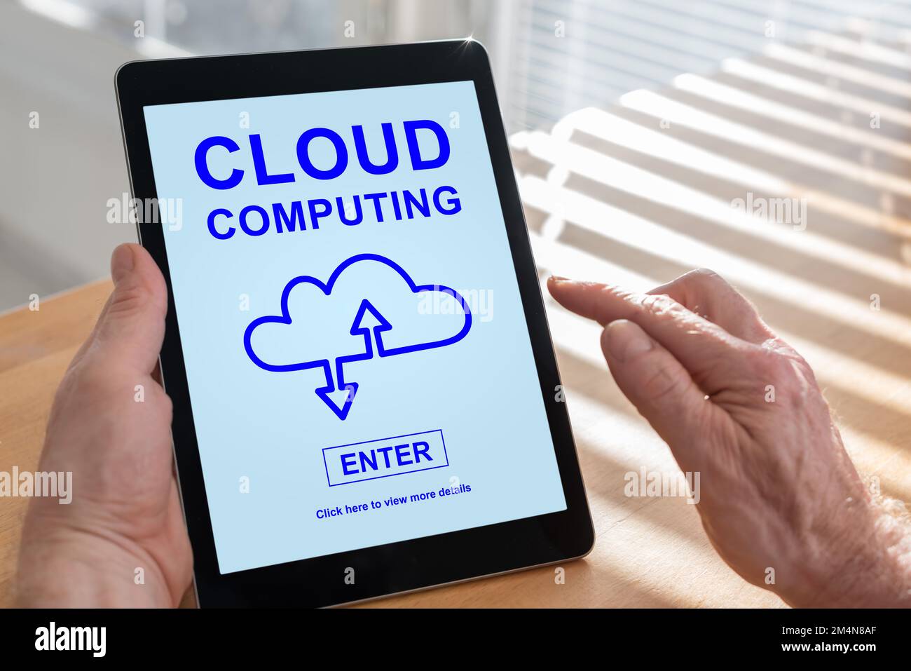Tablet screen displaying a cloud computing concept Stock Photo - Alamy