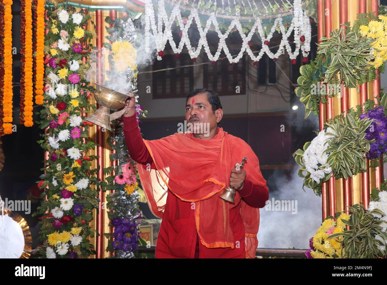 Pujari worshiping in a temple beautiful Stock Photos Stock Photo - Alamy