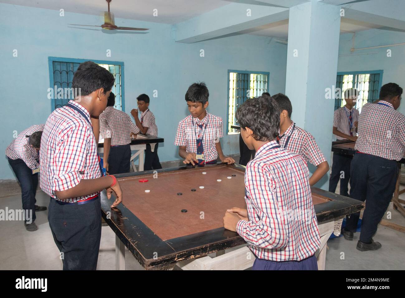 Indian boy playing board game hi-res stock photography and images - Alamy