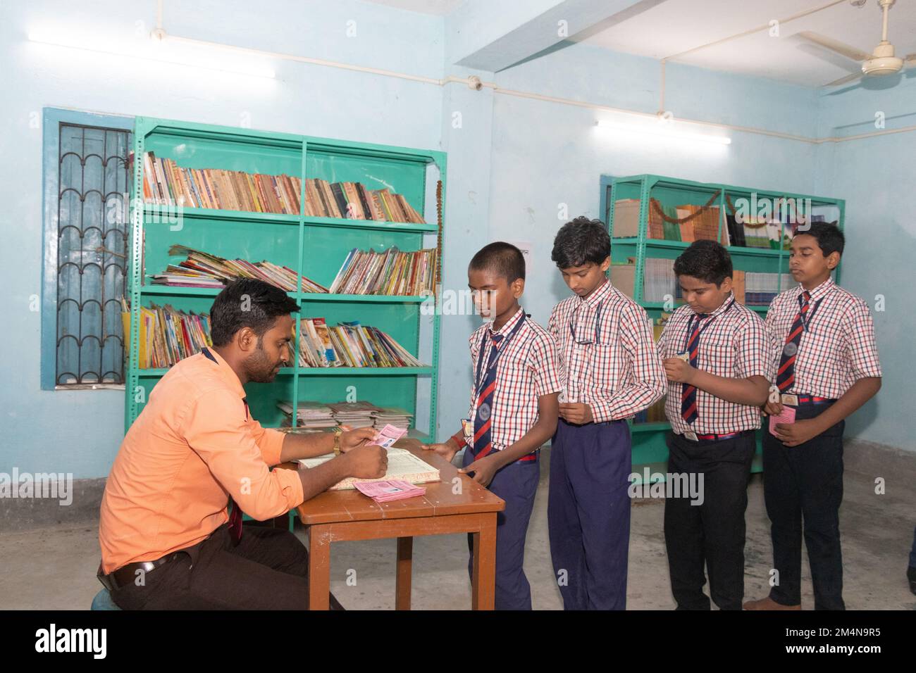 Student in school library stock photos Stock Photo - Alamy