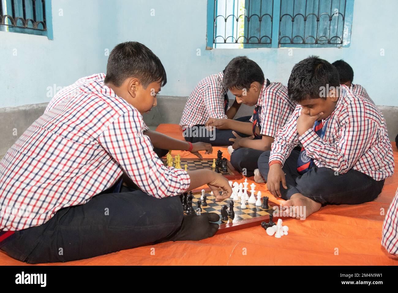 Children playing chess white background hi-res stock photography and ...